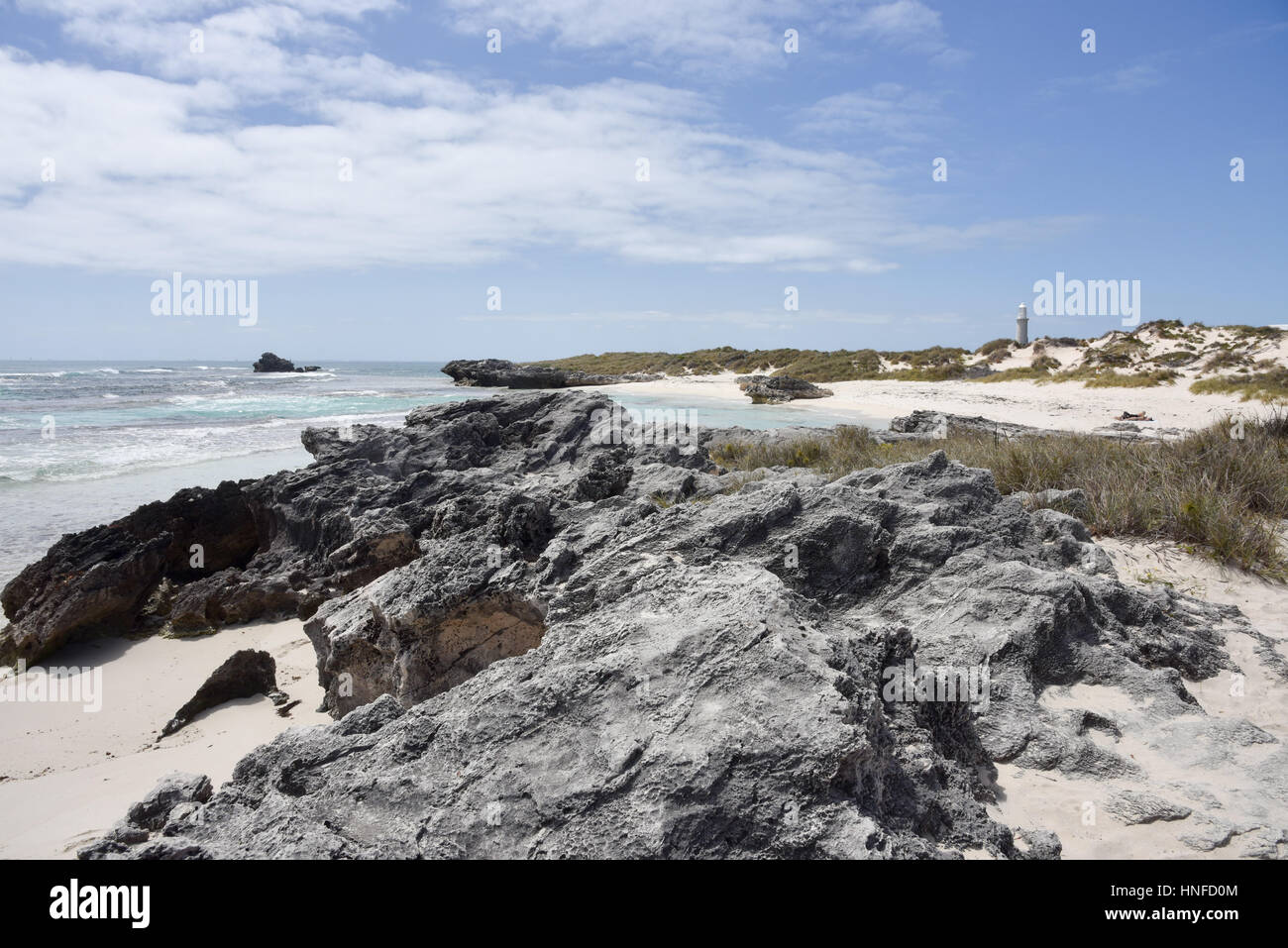 Eroded limestone at remote beach with the Indian Ocean at Rottnest ...