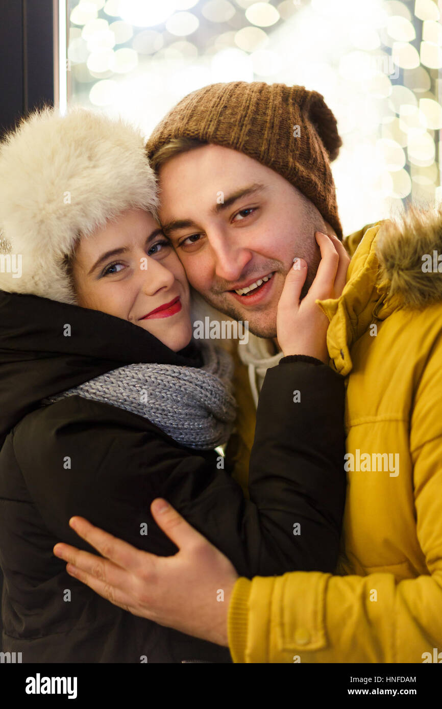Loving couple on romantic walk at night city Stock Photo - Alamy
