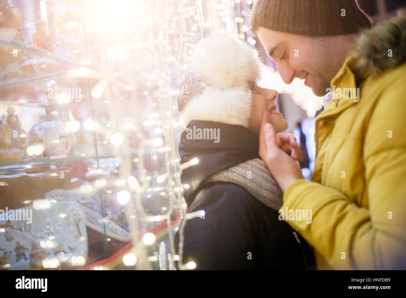 Romantic photo of happy couple on street at night Stock Photo - Alamy
