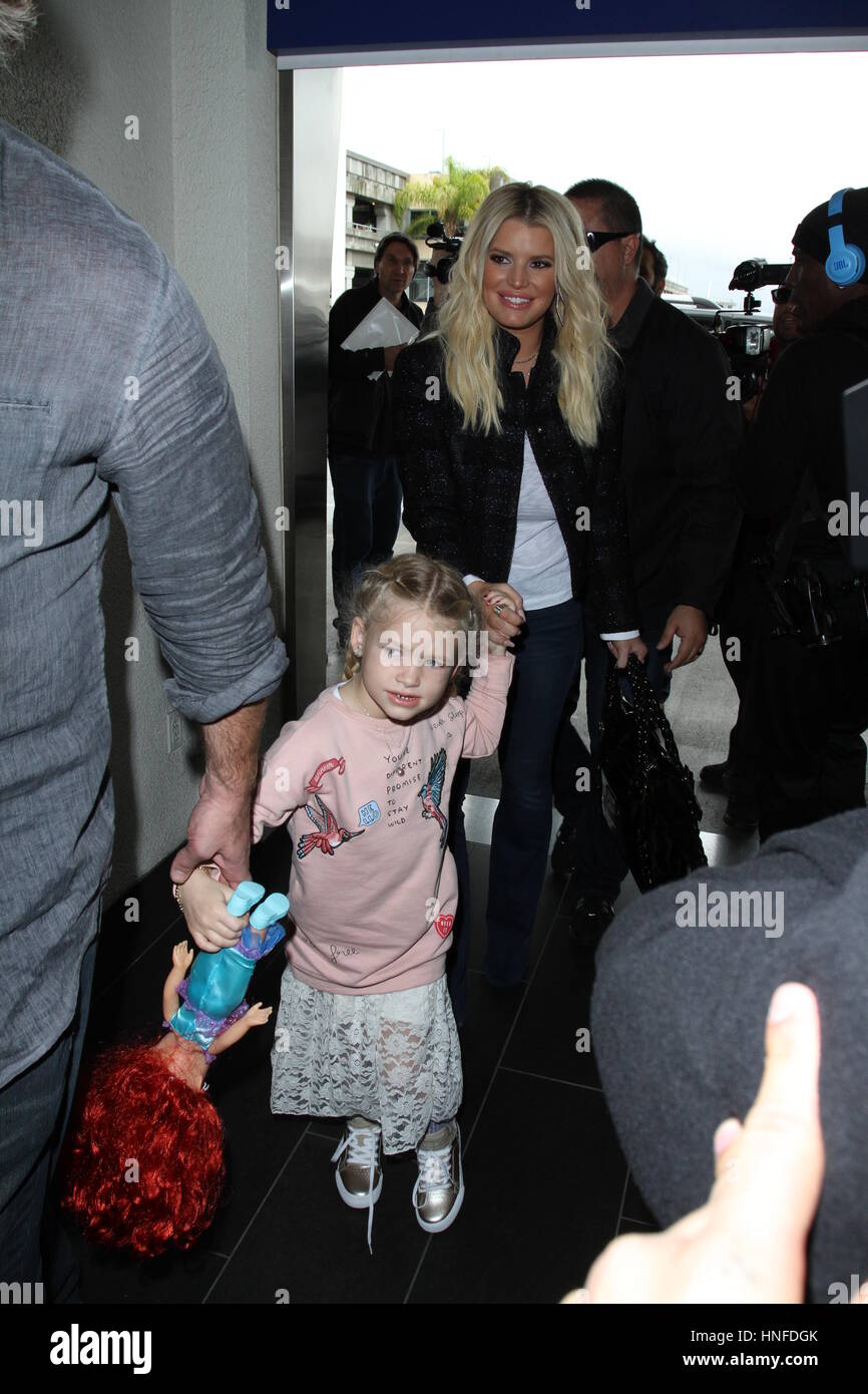 Jessica Simpson and her family arrive at Los Angeles International ...