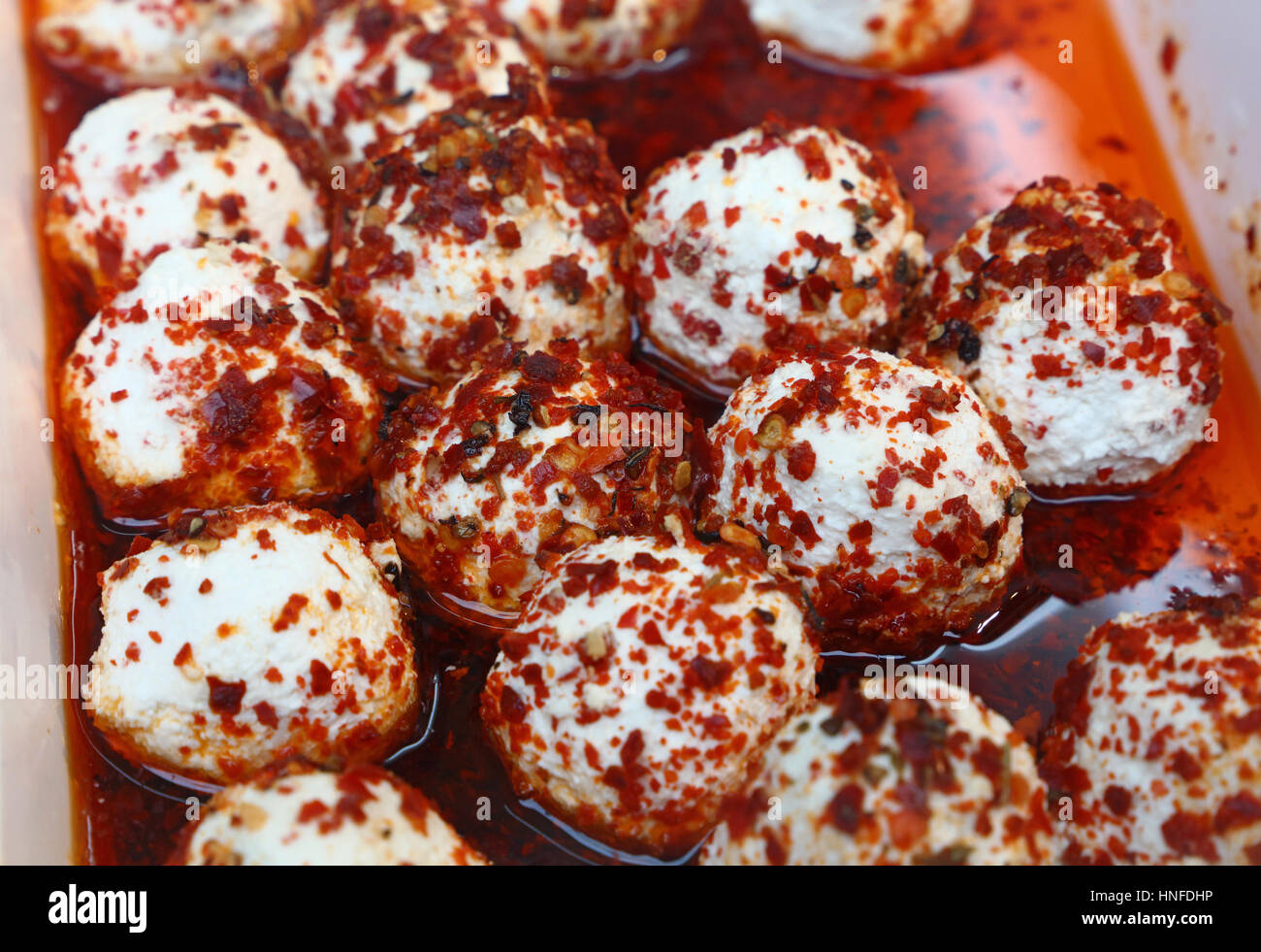 Pickled red hot Italian pepperoncini round pepper stuffed with fresh ...