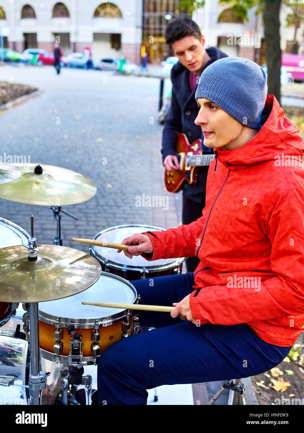 Festival music band. Friends playing on percussion instruments city ...