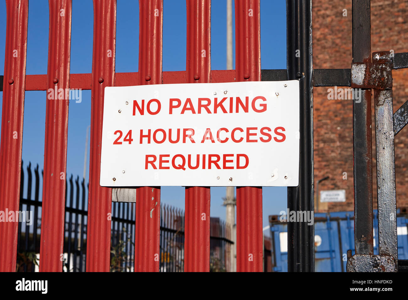 no parking sign 24 hour access required on a fence in the uk Stock ...