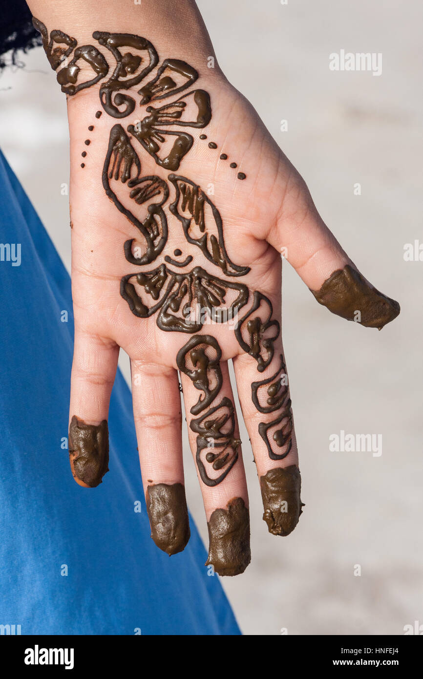 Indian girls with mehndi on hands.Mehndi is the application of henna as ...
