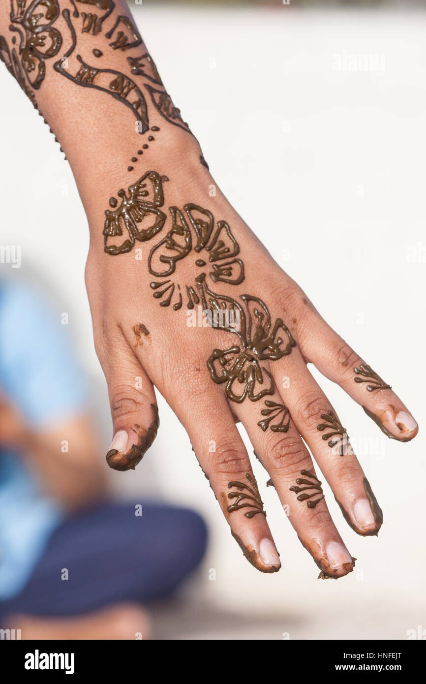 Indian girls with mehndi on hands.Mehndi is the application of henna as ...