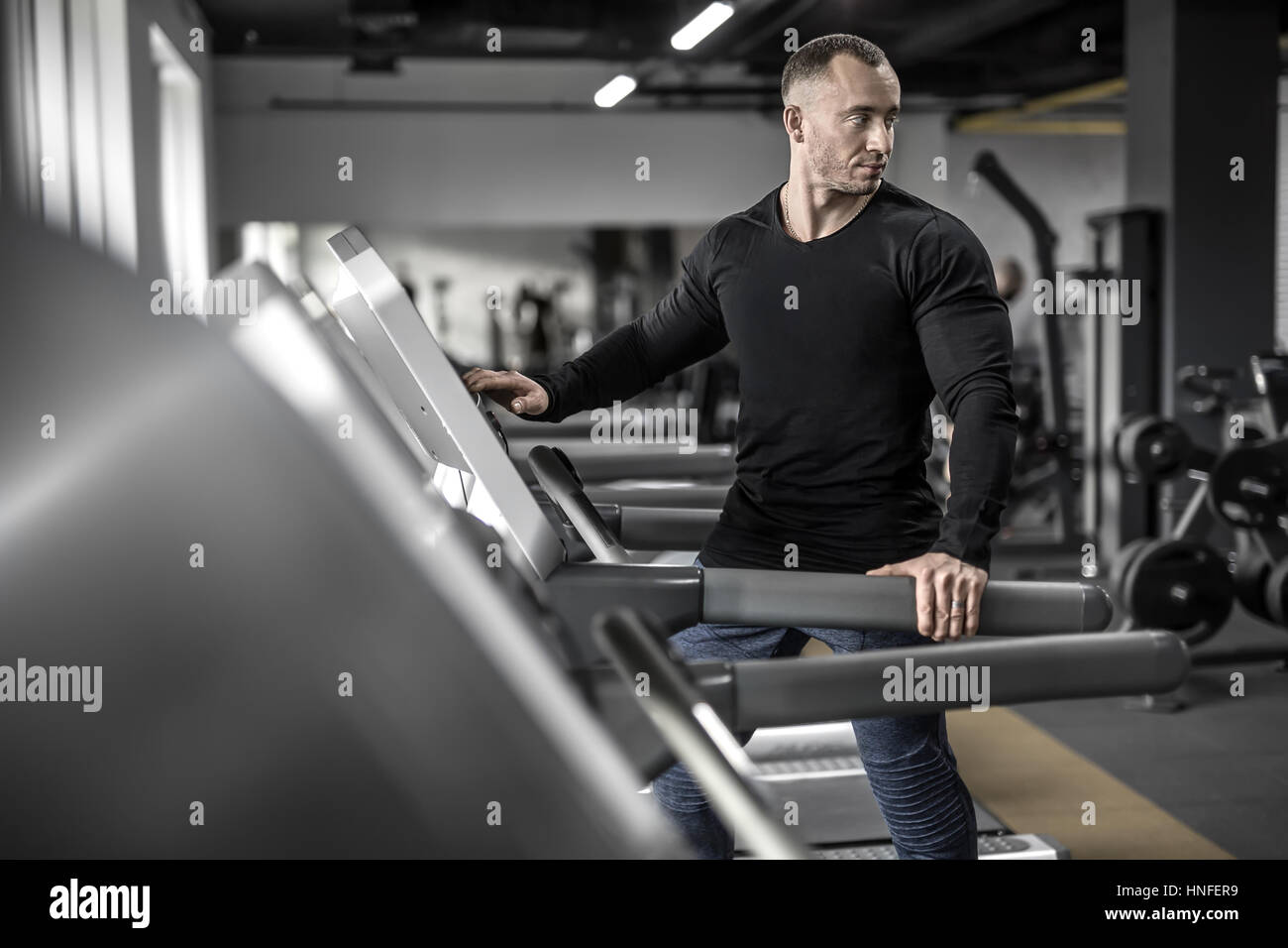 Muscular man in blue pants hi-res stock photography and images - Alamy
