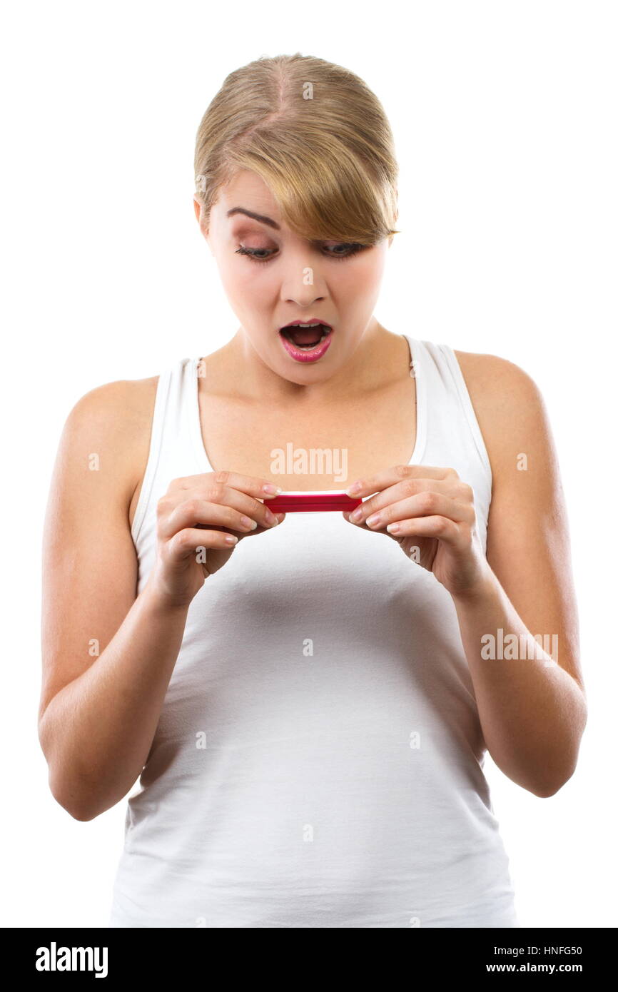 Unhappy Worried Shocked Woman Looking At Pregnancy Test With Positive