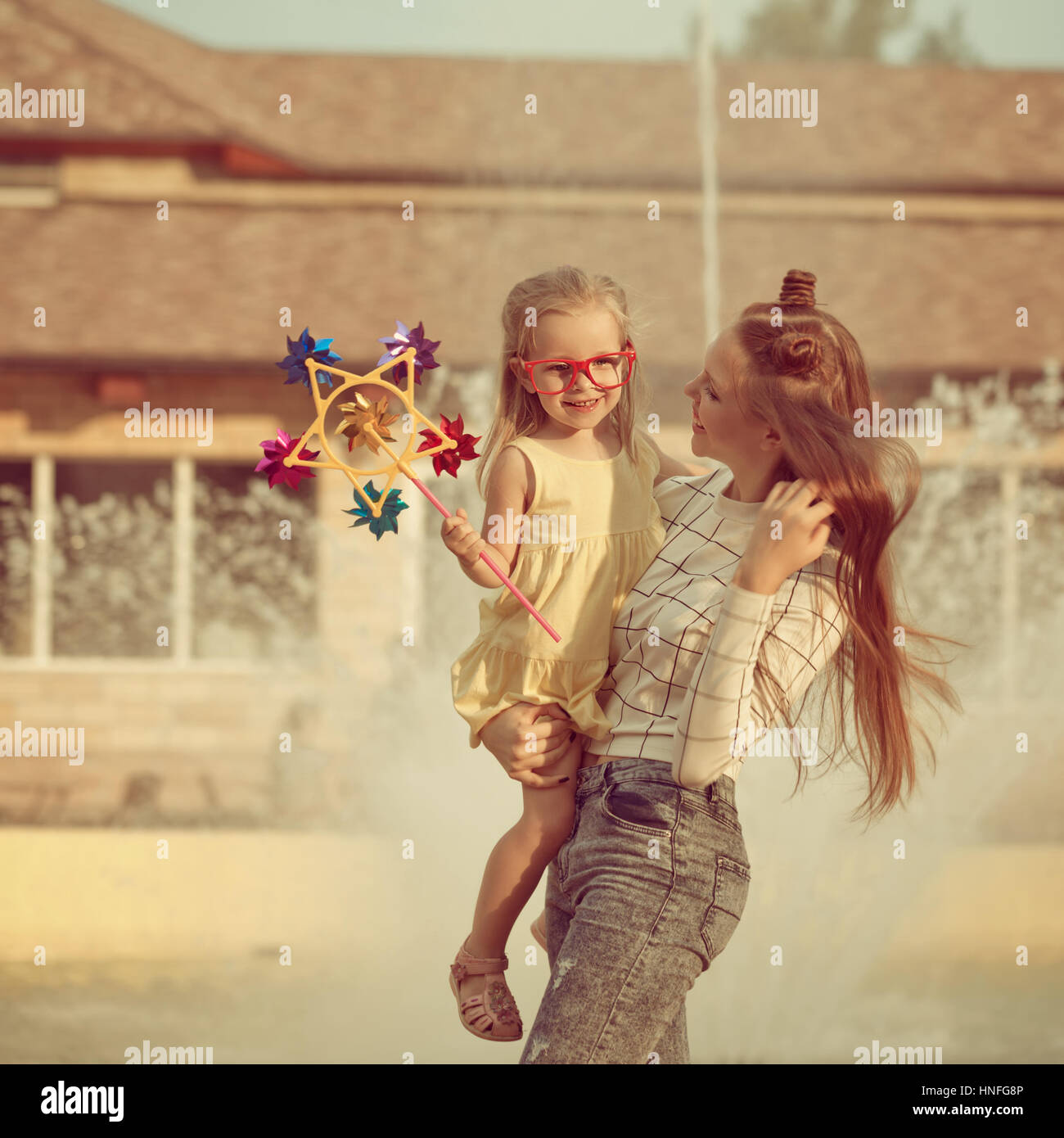 Girl With A Pinwheel High Resolution Stock Photography and Images - Alamy