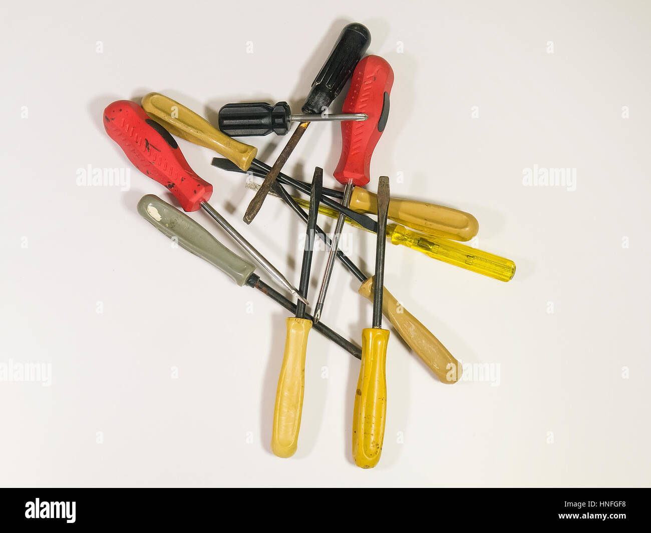 An old colorful screwdriver isolated on a white background Stock Photo ...