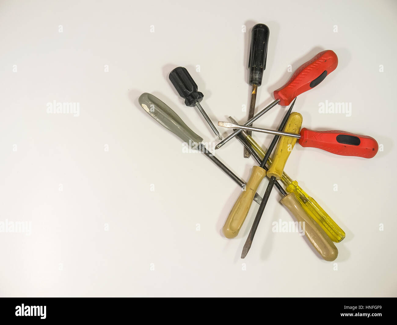 The colorful old screwdriver isolated on a white background Stock Photo ...