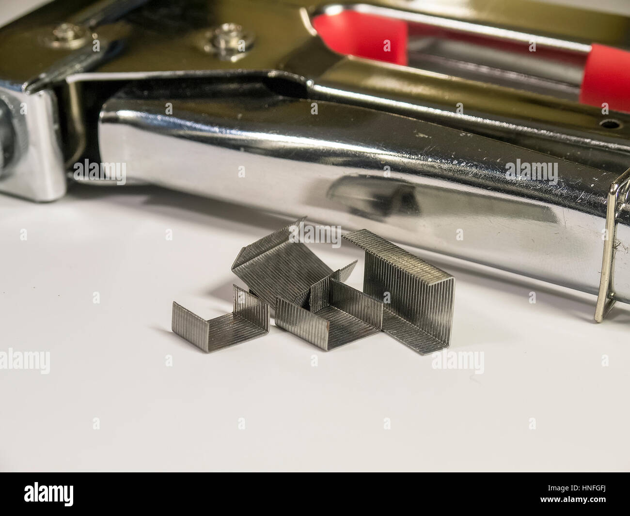 The staple gun on a white background close-up. Isolated Stock Photo - Alamy The staple gun on a white background close-up. Isolated Stock Photo - Alamy
