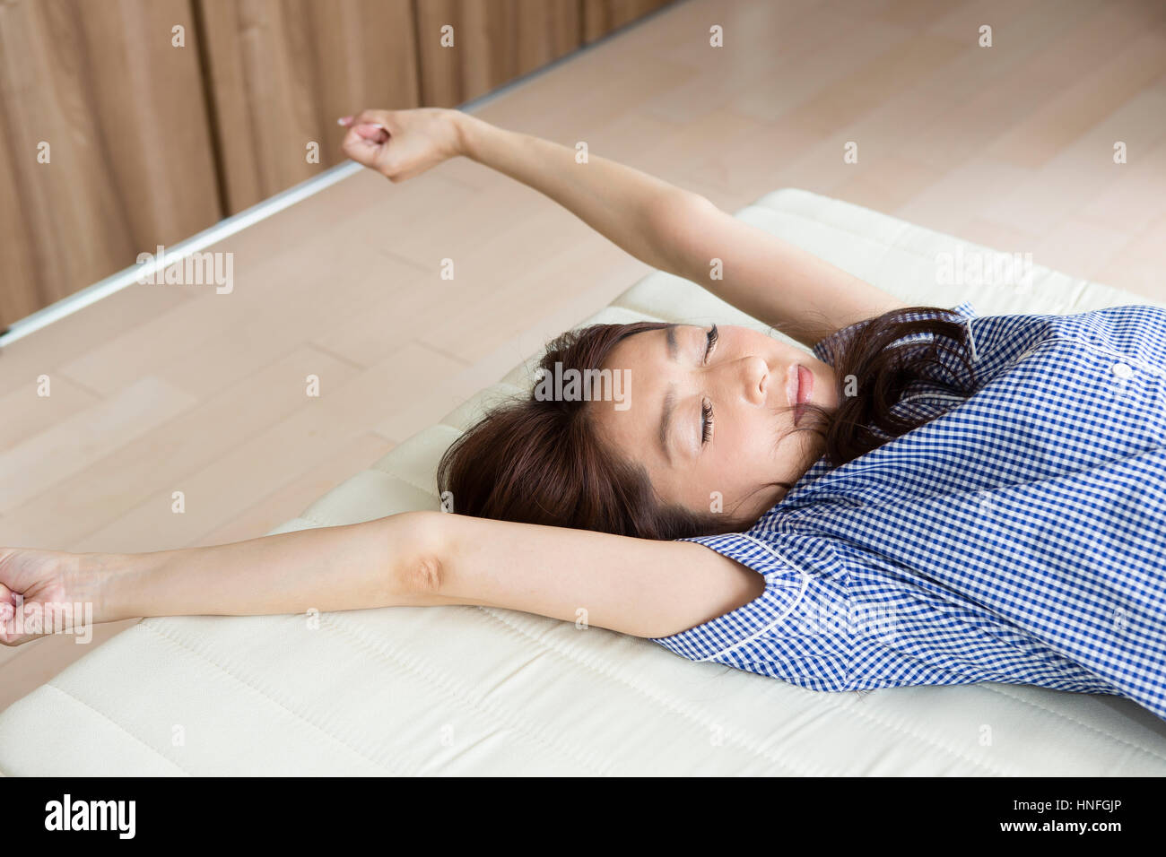 A woman having a stretch Stock Photo - Alamy