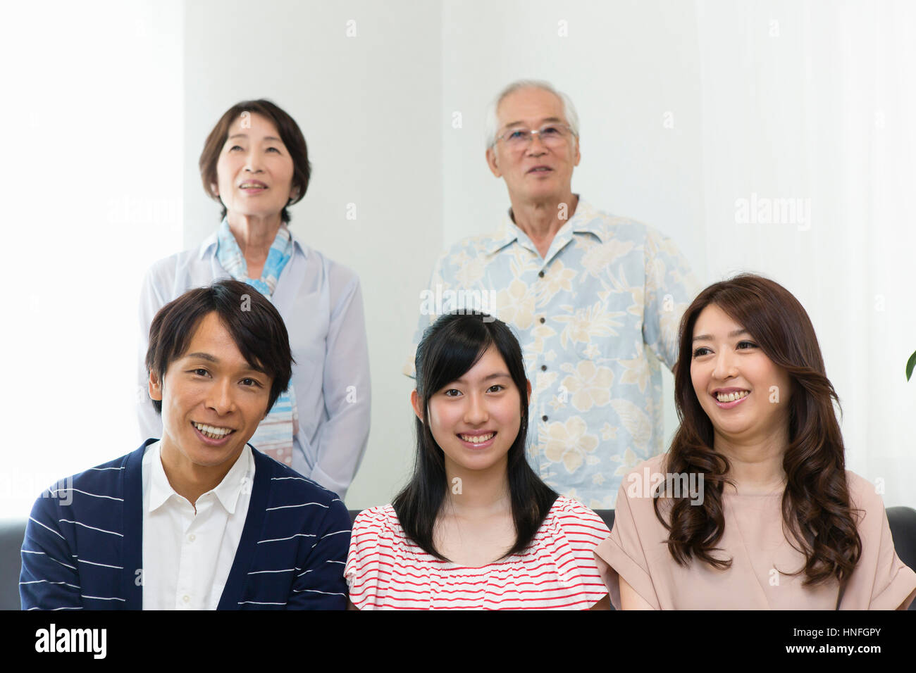 Three generation family Stock Photo - Alamy