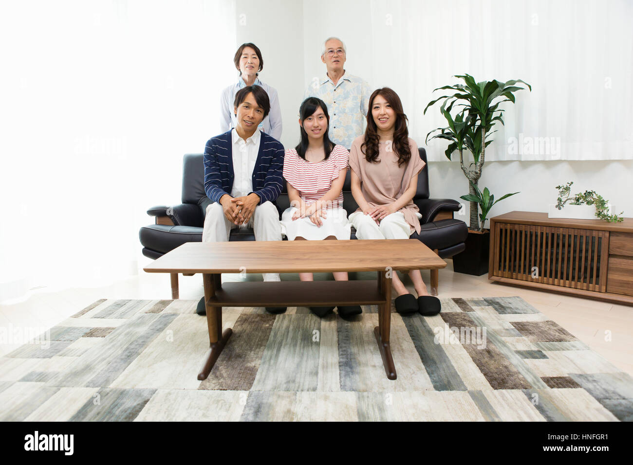 Three generation family Stock Photo - Alamy