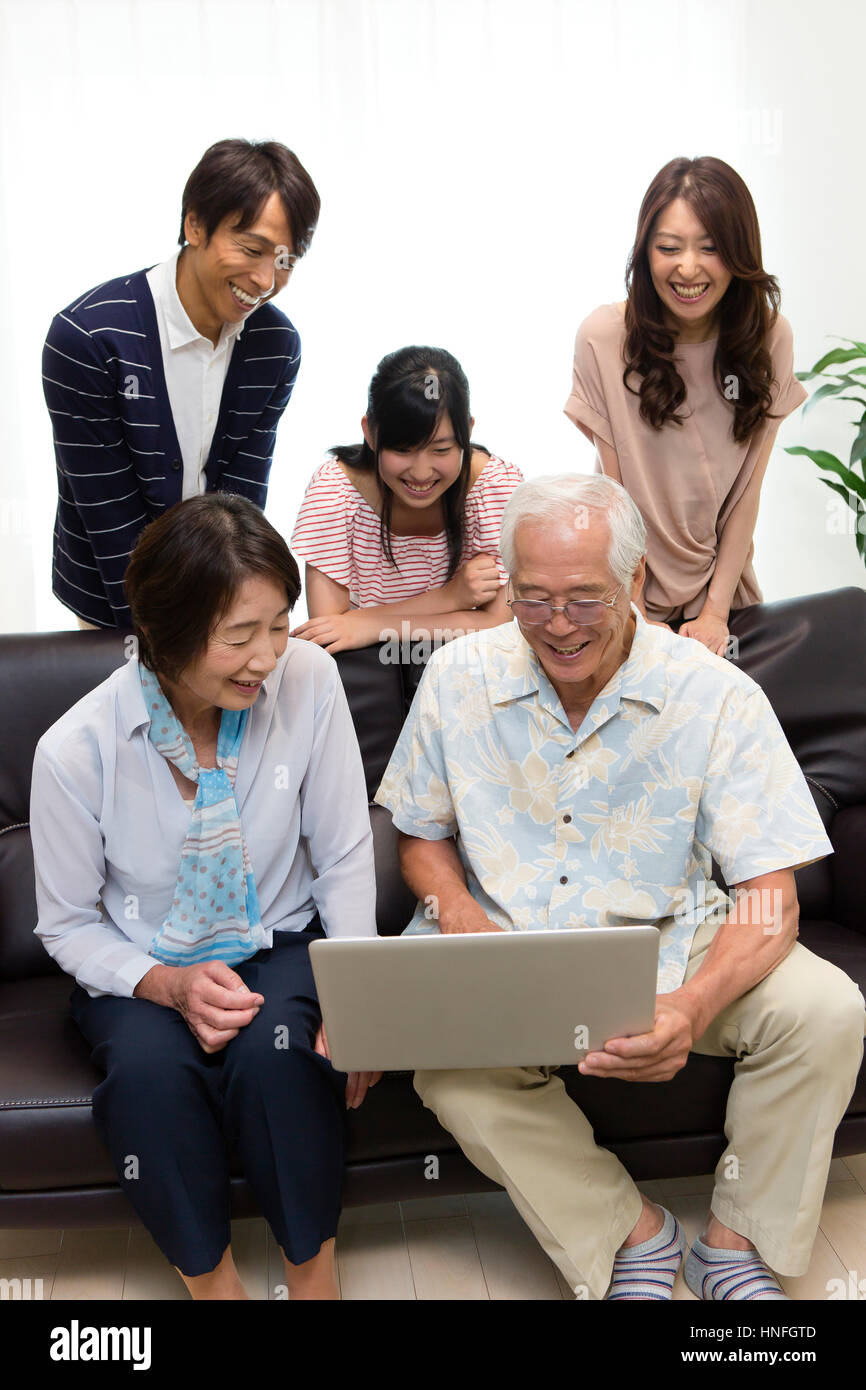 Family member enjoying conversation Stock Photo - Alamy