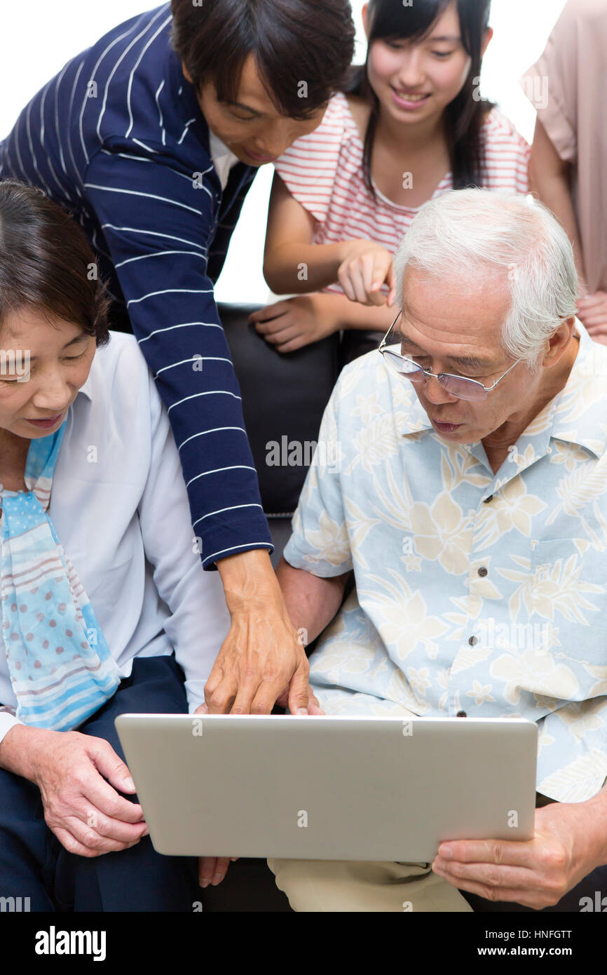 Family member enjoying conversation Stock Photo - Alamy