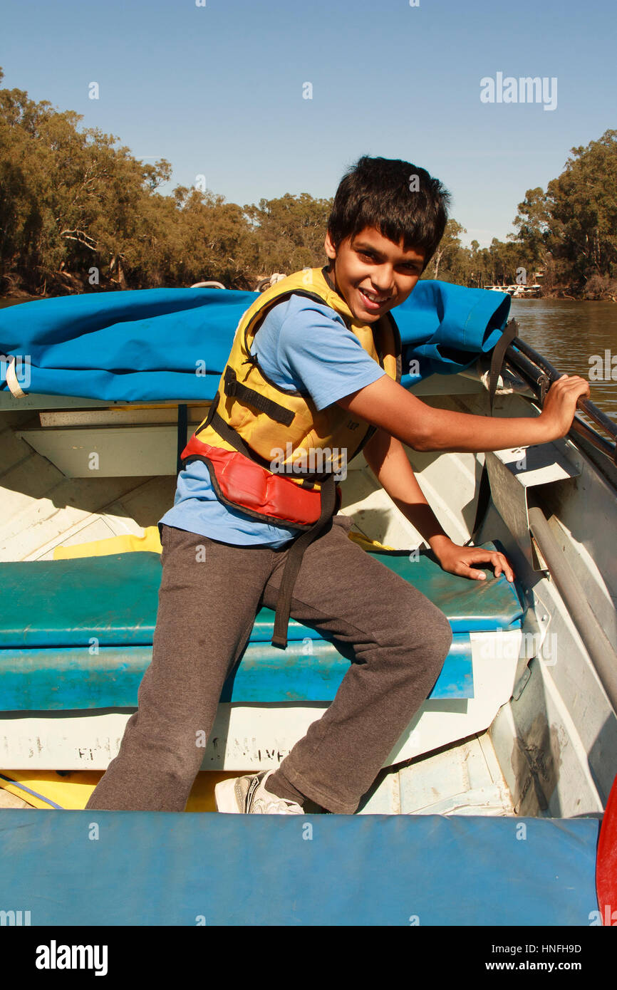 boy on a boat Stock Photo - Alamy