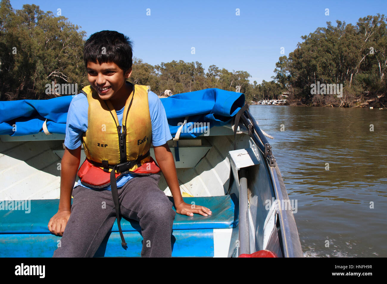 boy on a boat Stock Photo - Alamy