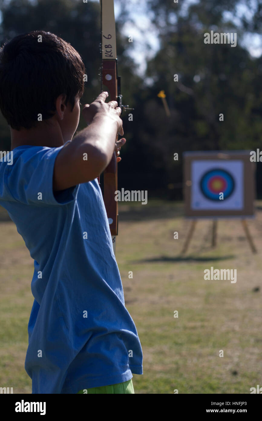 Boy playing archery Stock Photo - Alamy