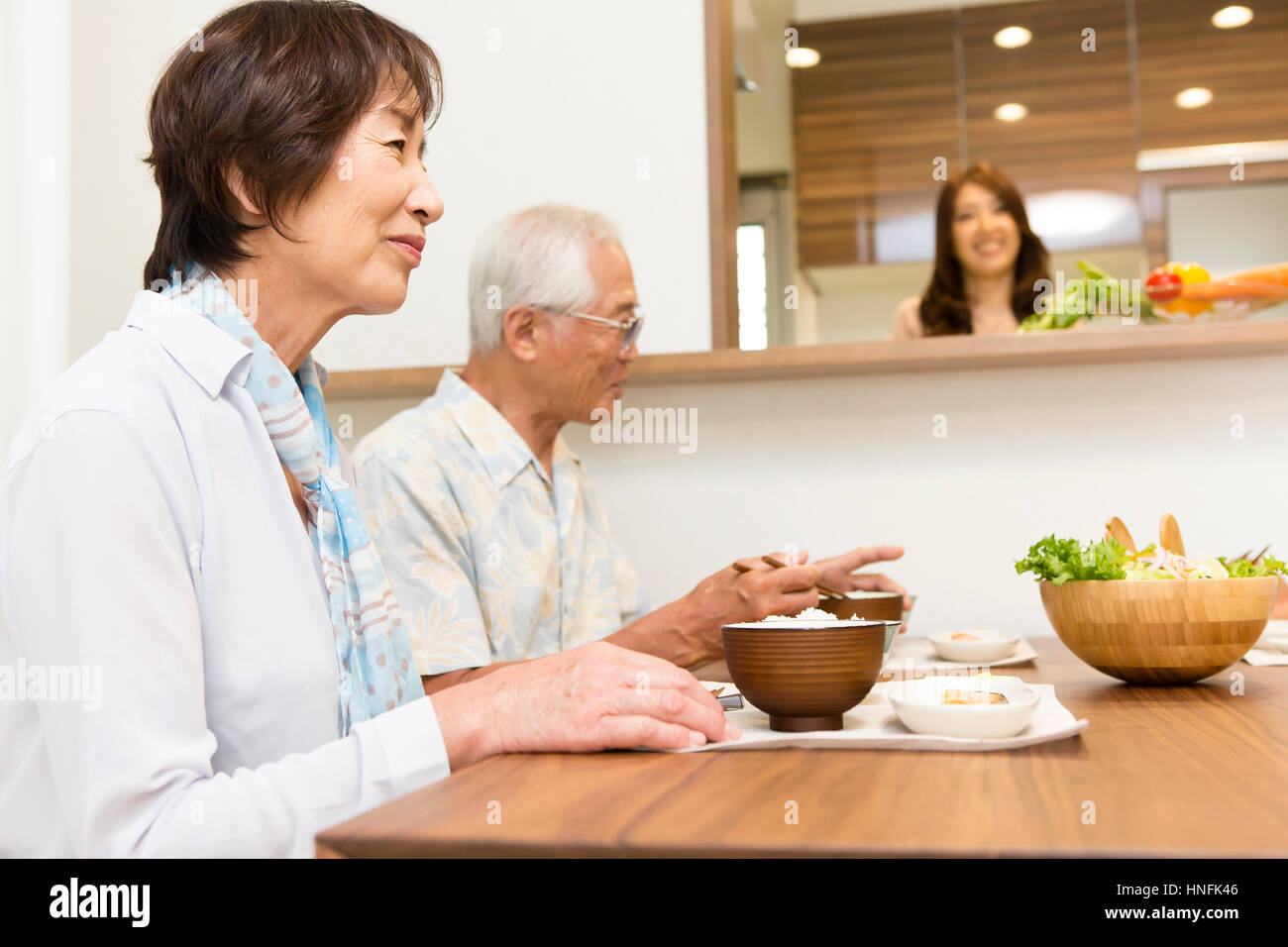 Senior people at a dining table Stock Photo - Alamy