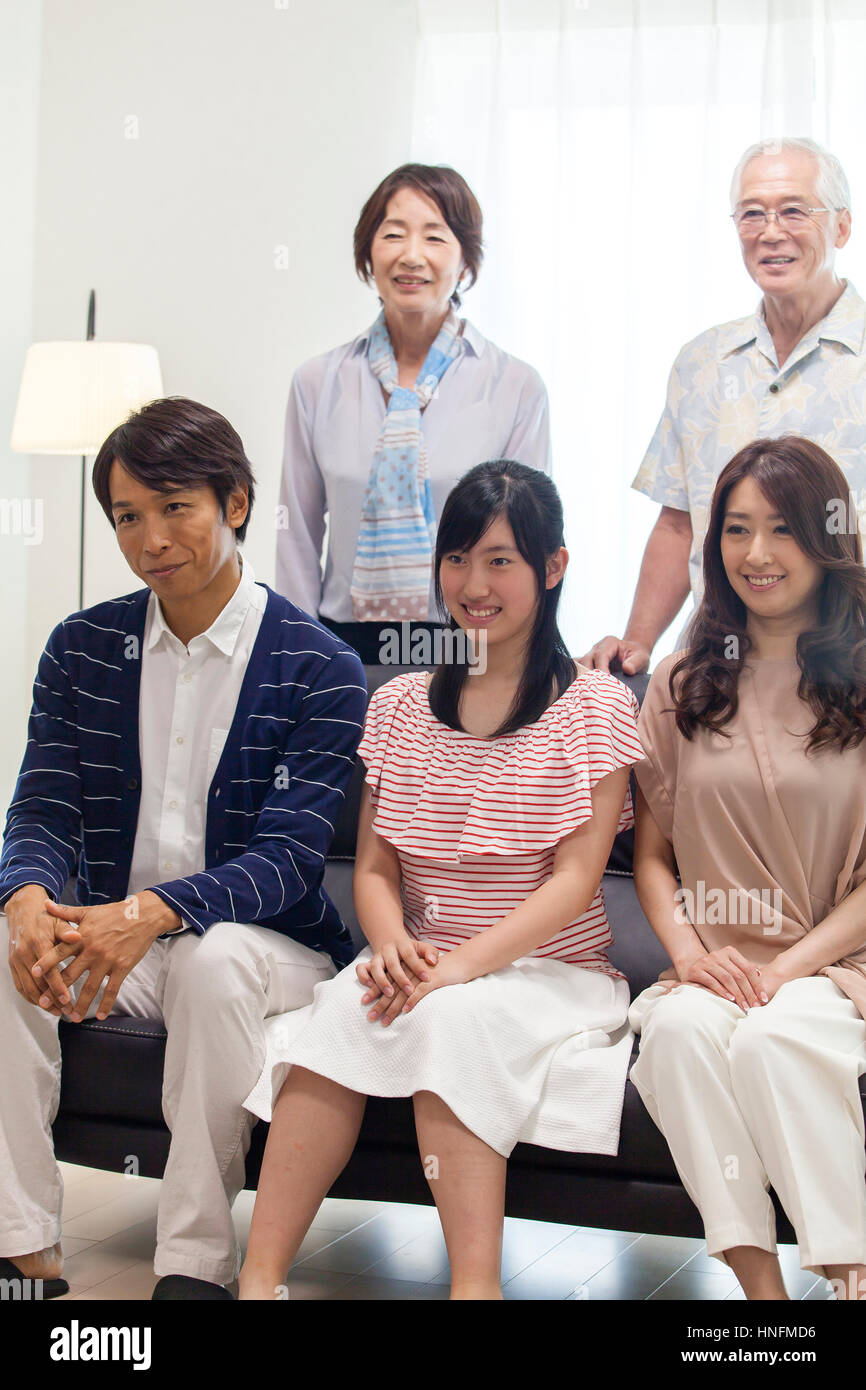 Family member enjoying conversation Stock Photo - Alamy