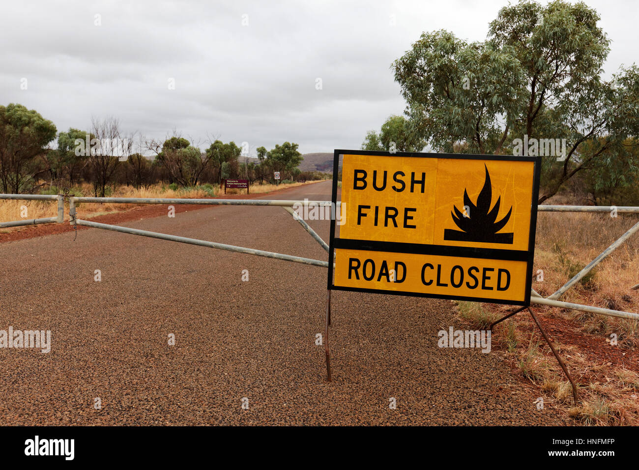 Road closed sign due to bush fire, Karijini National Park, Pilbara ...