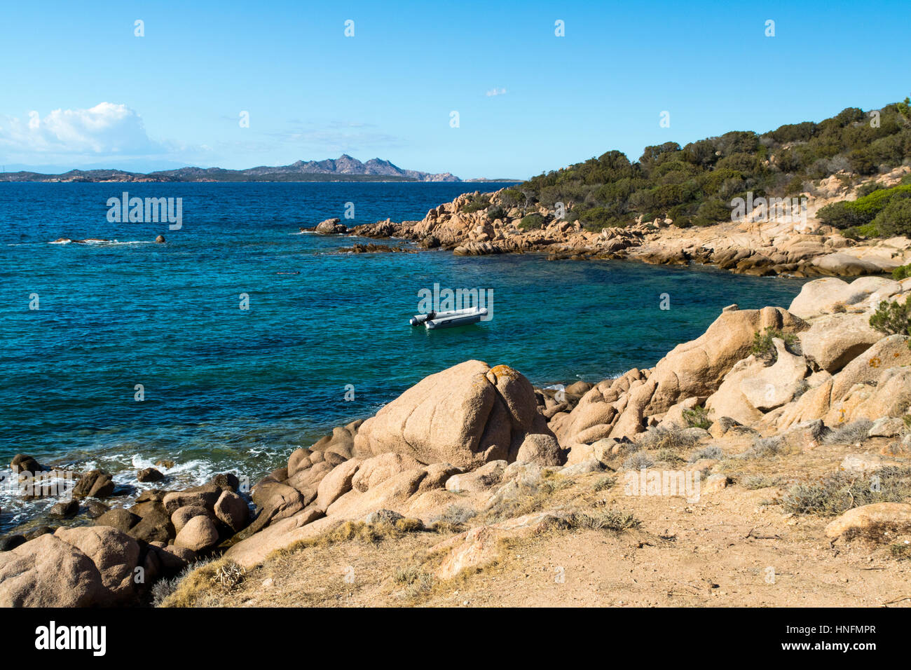 Picturesque Granite Coastline & Isola Caprera With Blue Sky – Baia ...