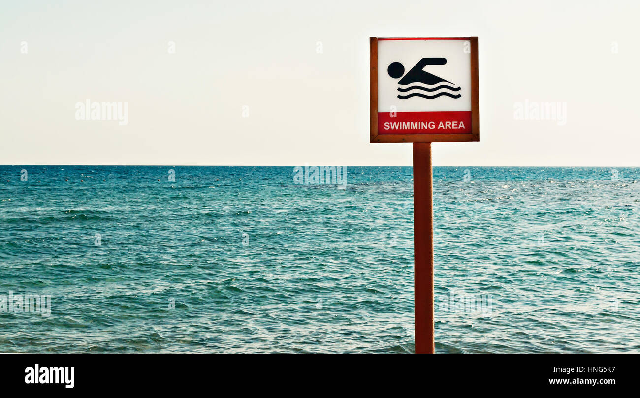 sign can float on the sea beach Stock Photo - Alamy