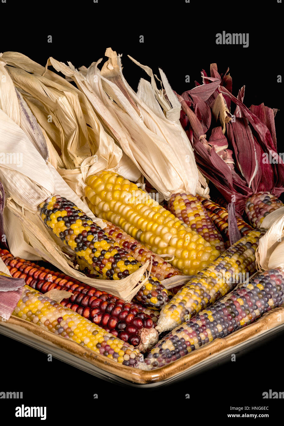 Dried holiday Indian corn displayed on a platter Stock Photo - Alamy