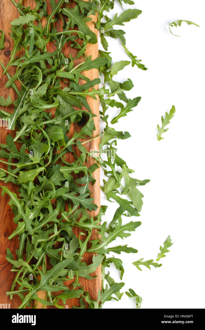 Fresh arugula leaves. Isolated on white background Stock Photo - Alamy