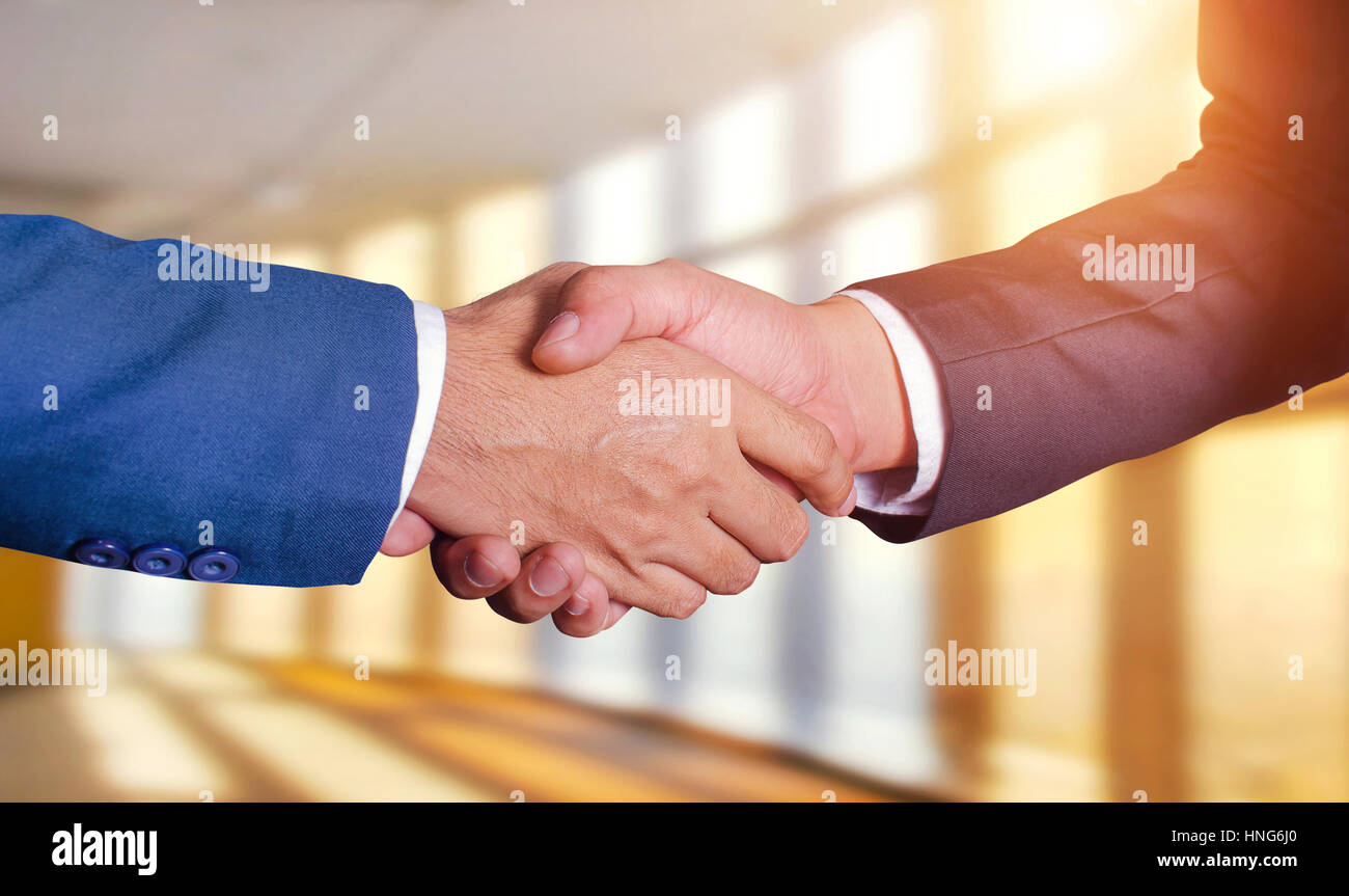 Two business men shaking hands Stock Photo - Alamy Two business men shaking hands Stock Photo - Alamy