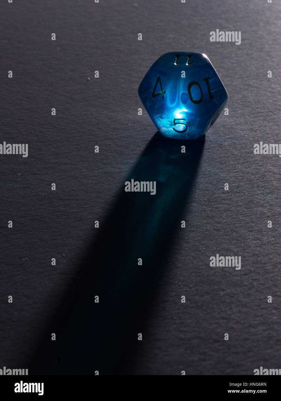 Trio of blue translucent gaming dice Stock Photo - Alamy