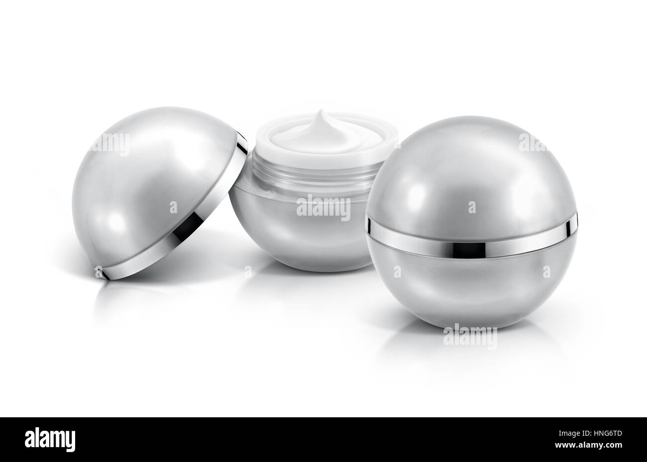 Two silver sphere cosmetic jar on white background Stock Photo - Alamy