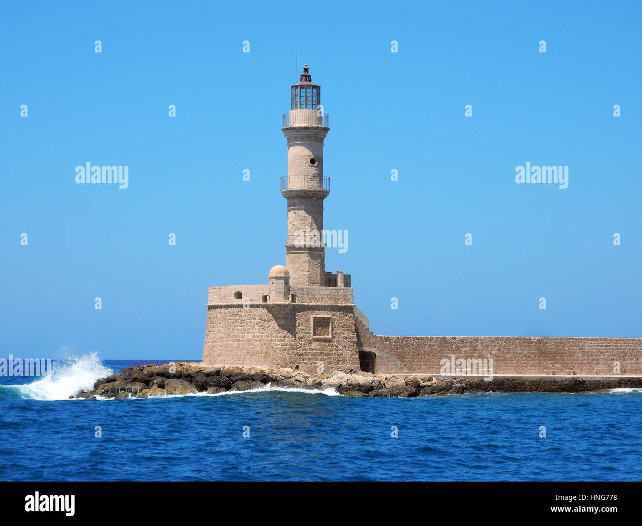 Lighthouse in sea bay waves hi-res stock photography and images - Alamy