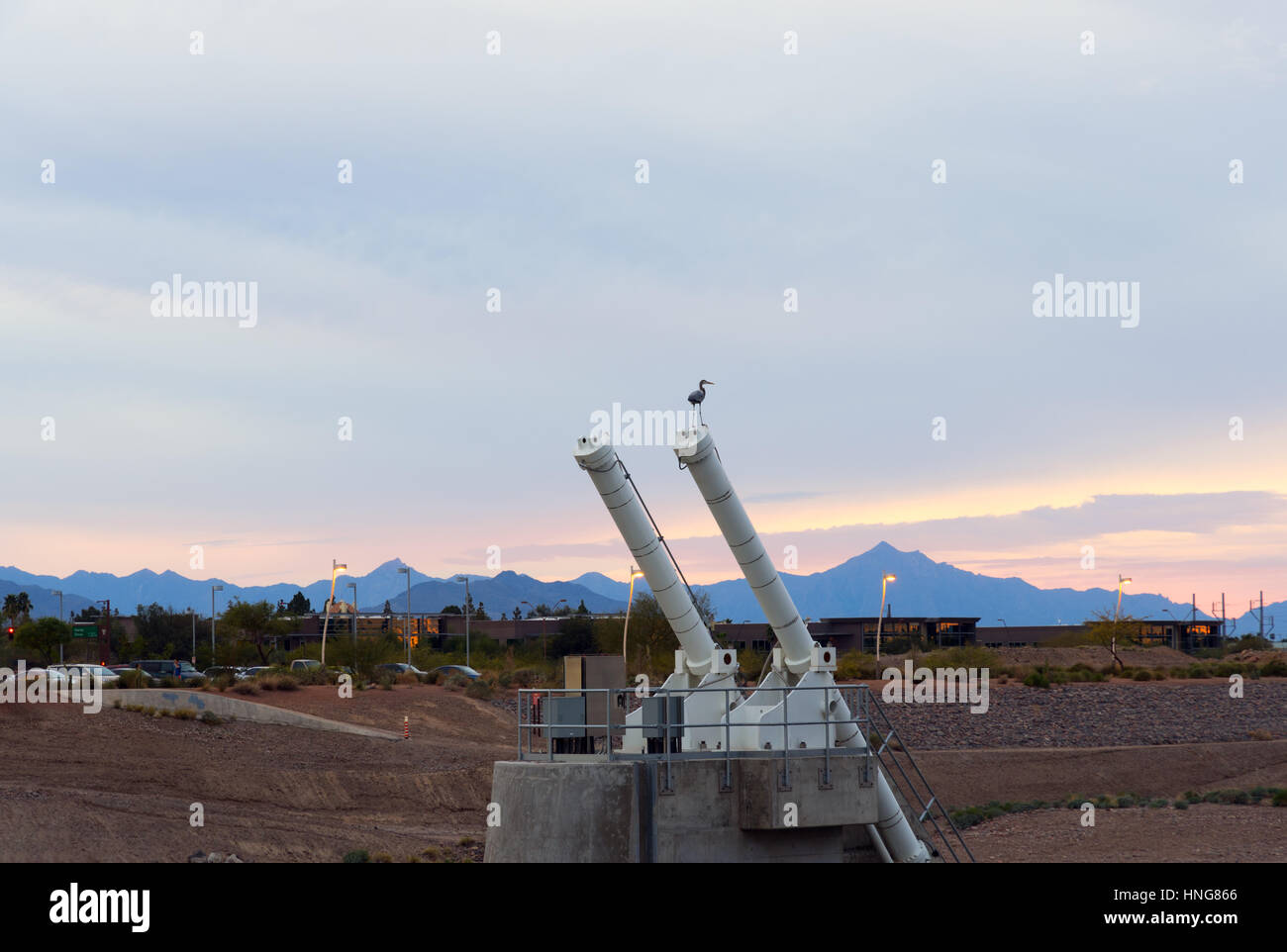 Tempe Town Lake Dam Hydraulic Cylinders With A Bird And Cloudy Sunset ...