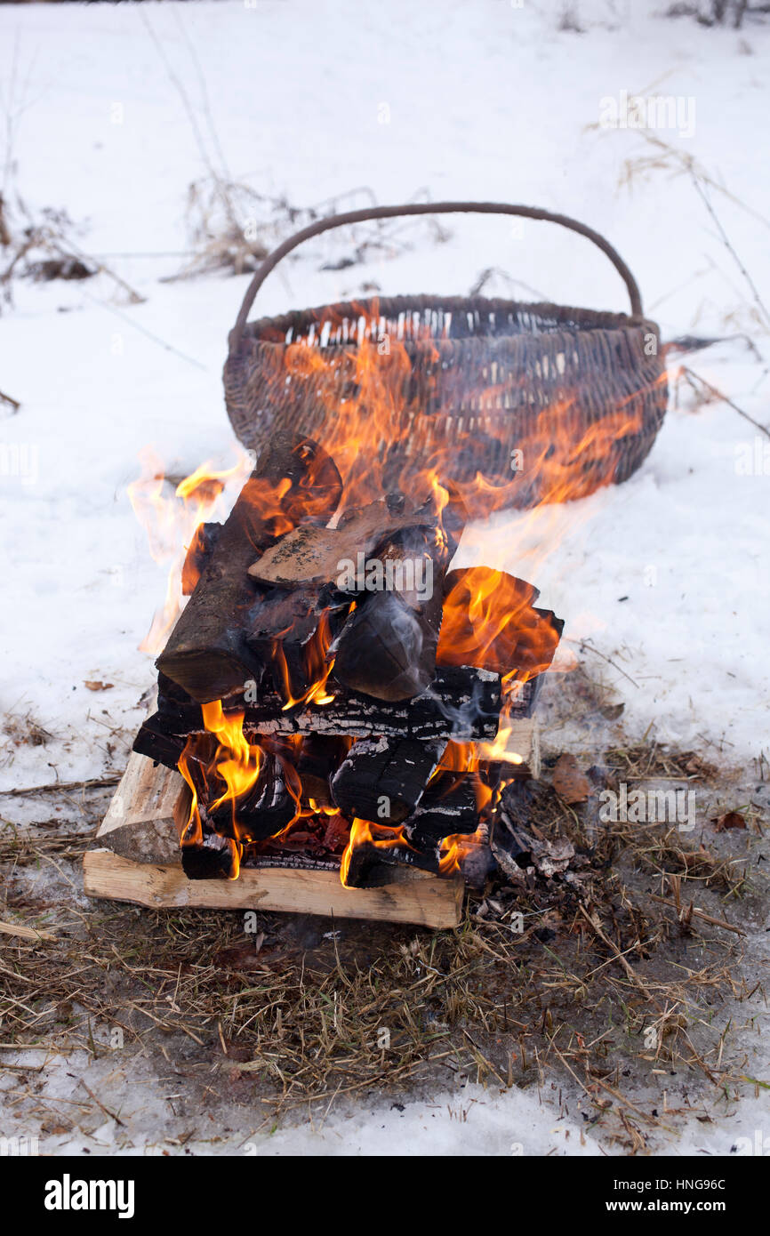 Camp fire at winter landscape hi-res stock photography and images - Alamy