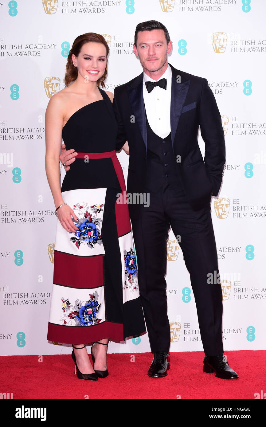 Daisy Ridley and Luke Evans in the press room during the EE British ...