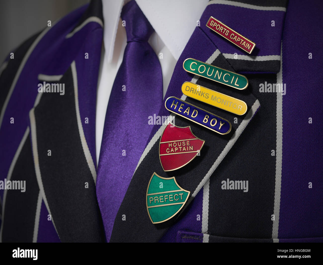 School boys blazer with school numerous badges Stock Photo - Alamy