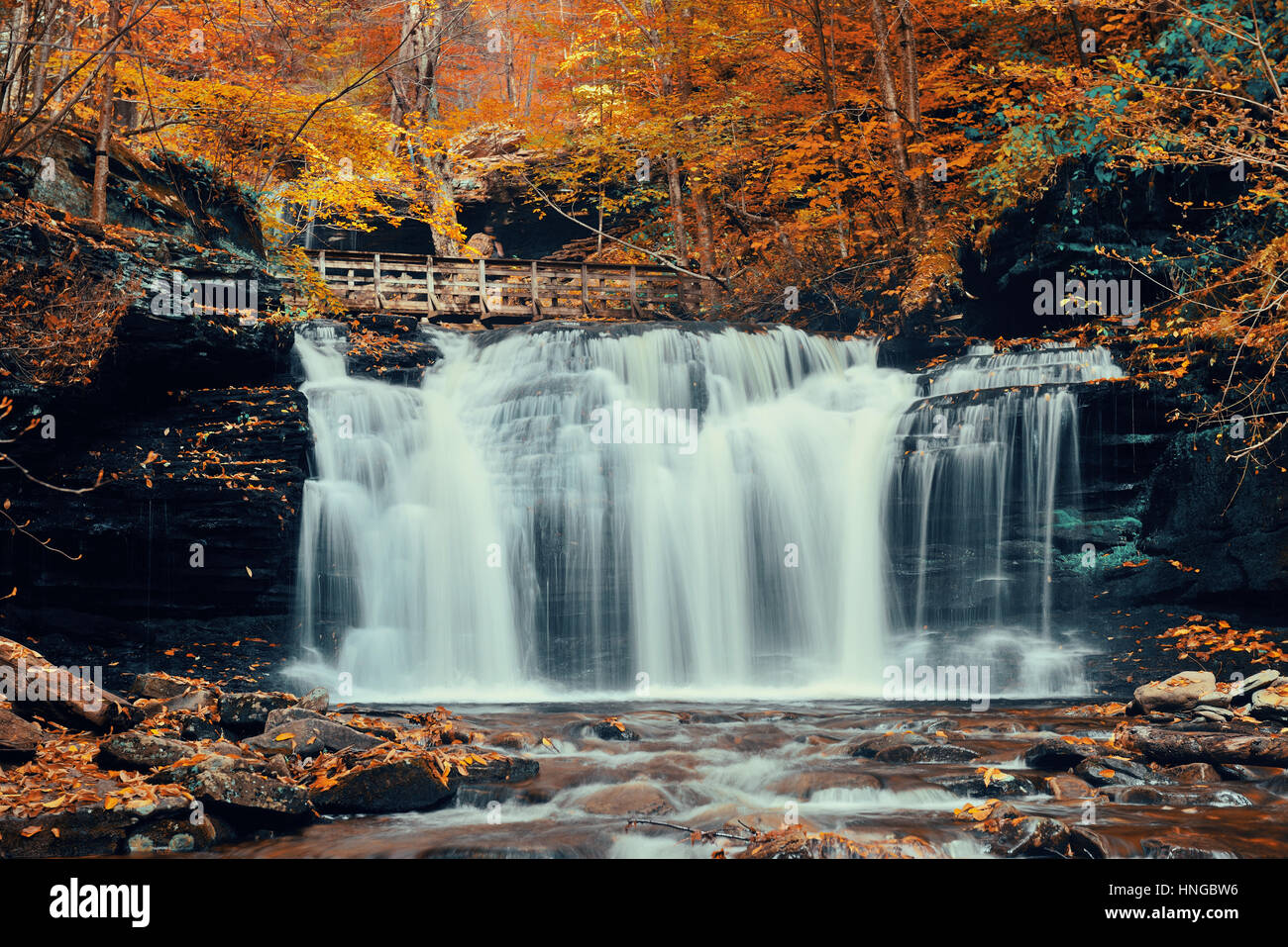 Autumn waterfalls in park with colorful foliage Stock Photo - Alamy