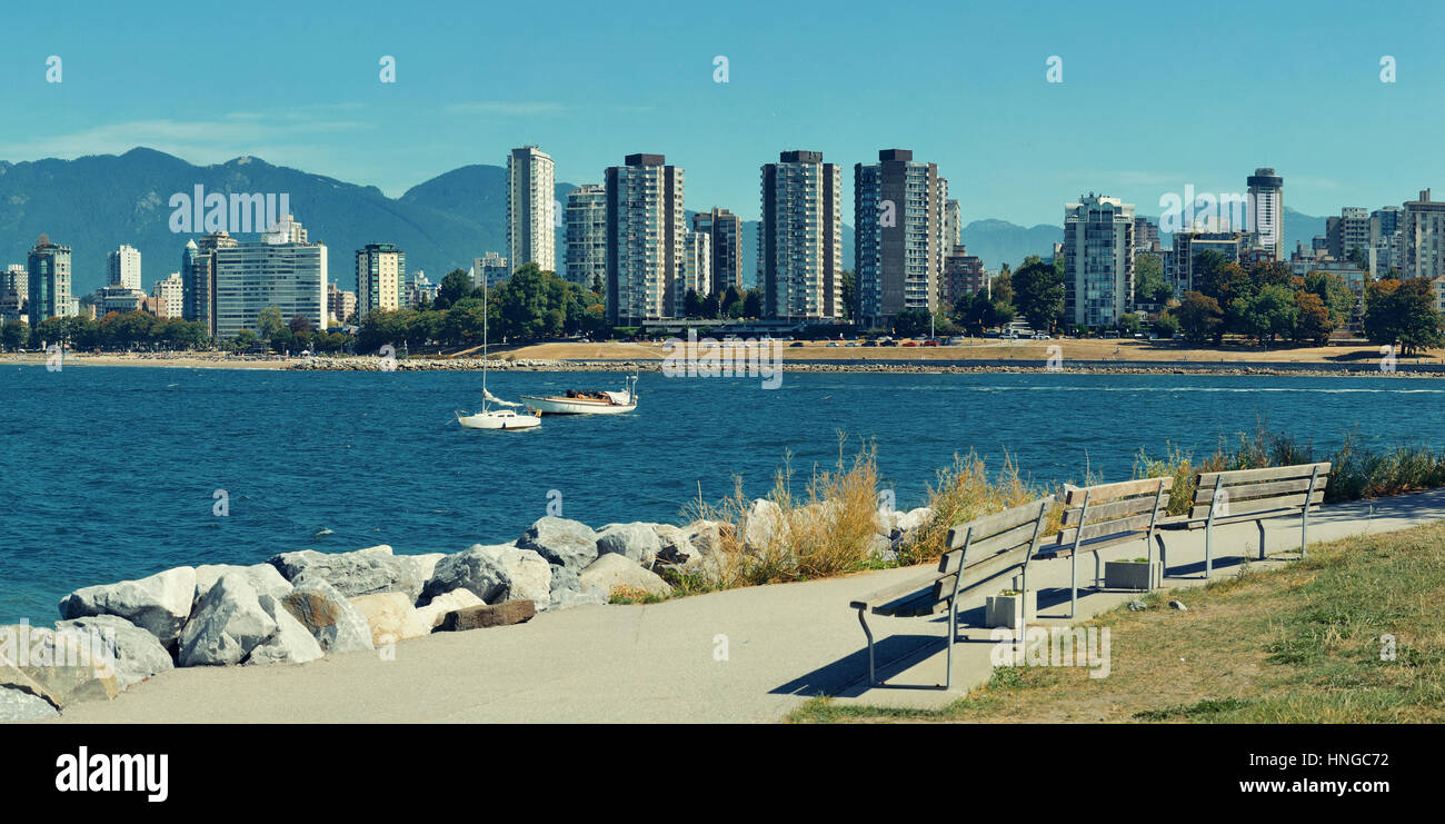 Vancouver city skyline at waterfront with bench in park Stock Photo - Alamy