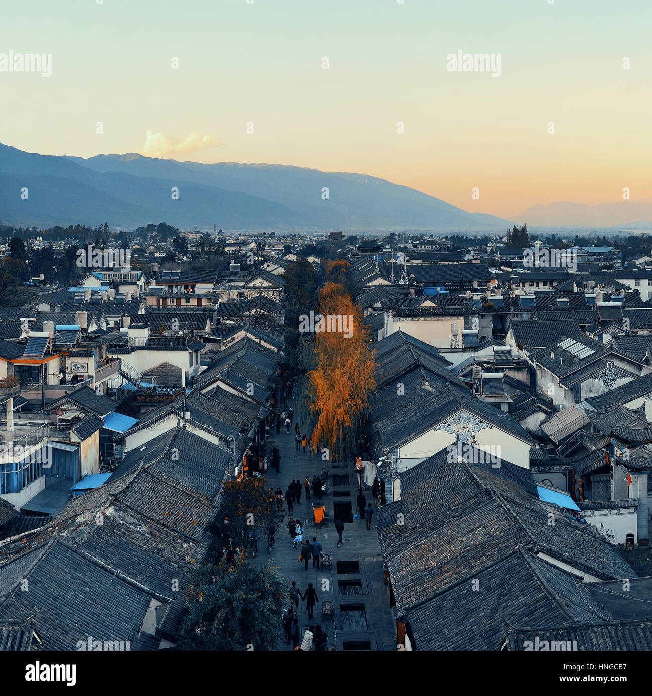 Dali old town rooftop view at sunset. Yunnan, China Stock Photo - Alamy