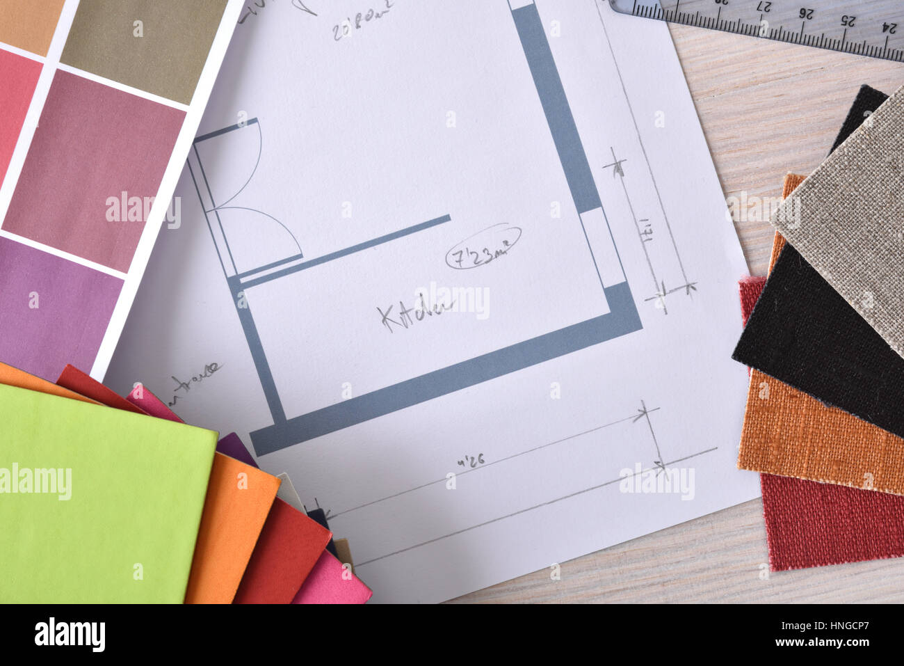 Designer and decorator detail workbench with interior plan of home ...