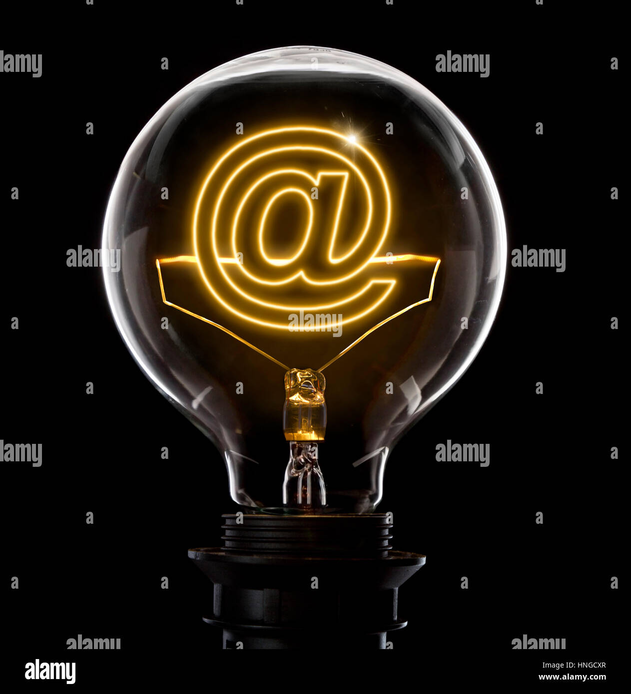 Clean and shiny lightbulb with an at symbol as a glowing wire.(series ...