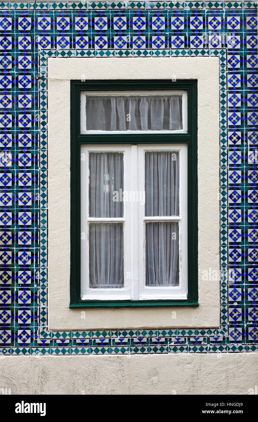 Typical portuguese window with azulejo tiles Stock Photo - Alamy