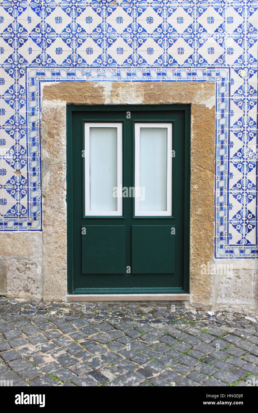 Typical portuguese door with azulejo tiles Stock Photo - Alamy