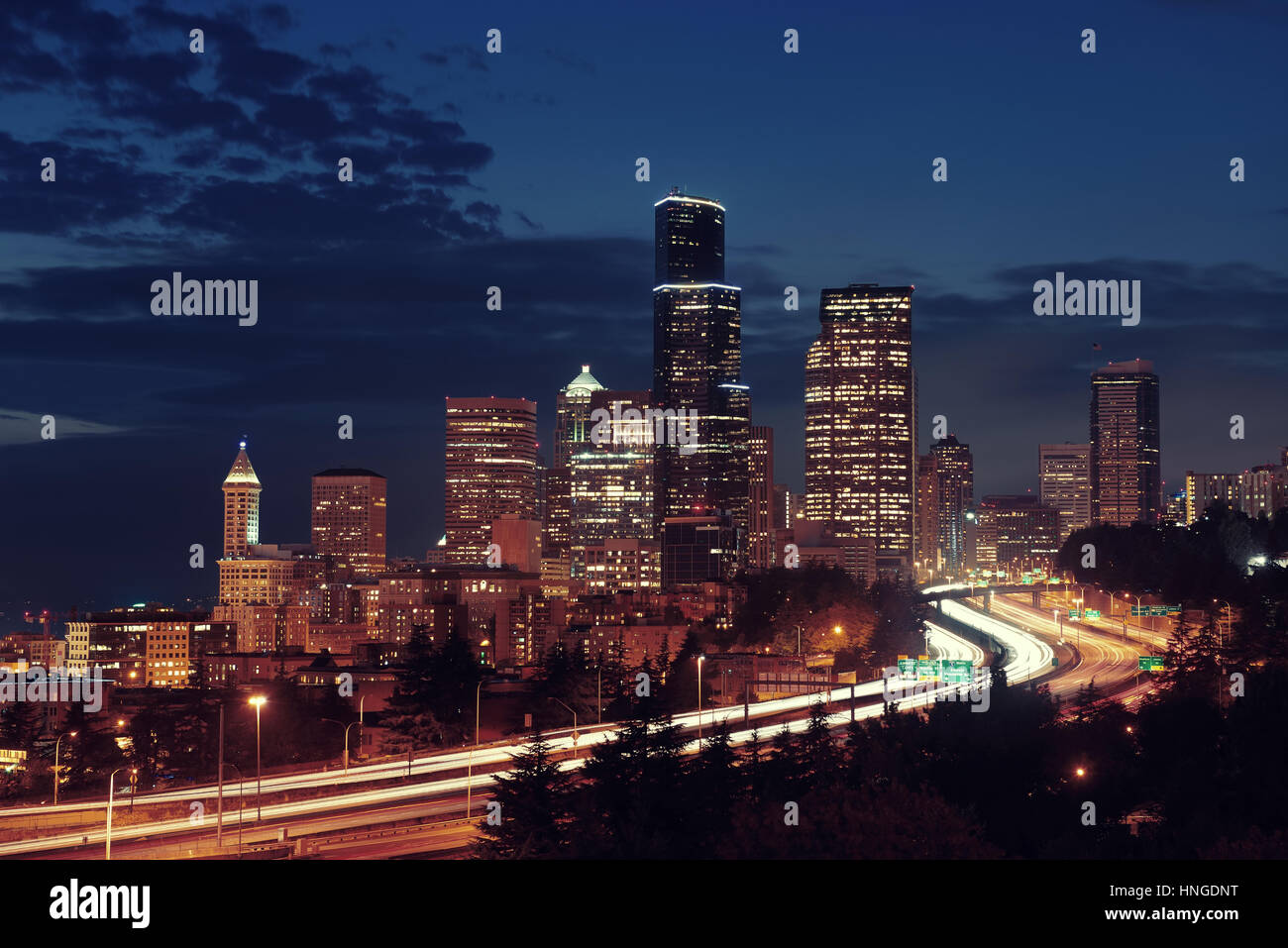 Seattle city view with urban architecture and traffic light trail at ...