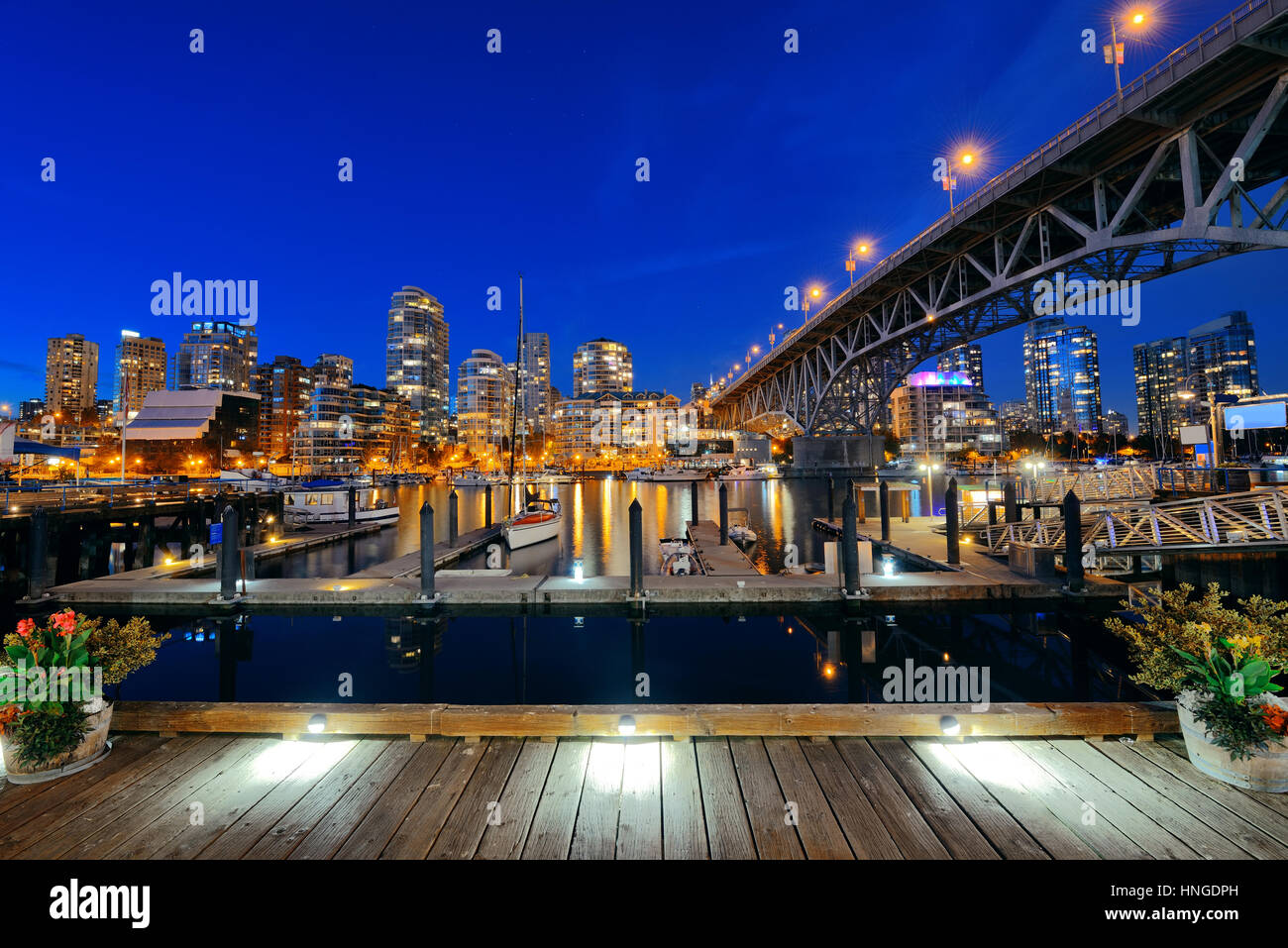 Vancouver False Creek at night with bridge and boat Stock Photo - Alamy