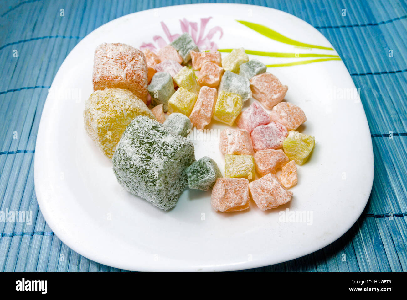 East sweets on a plate. Turkish delight, coconut Stock Photo - Alamy