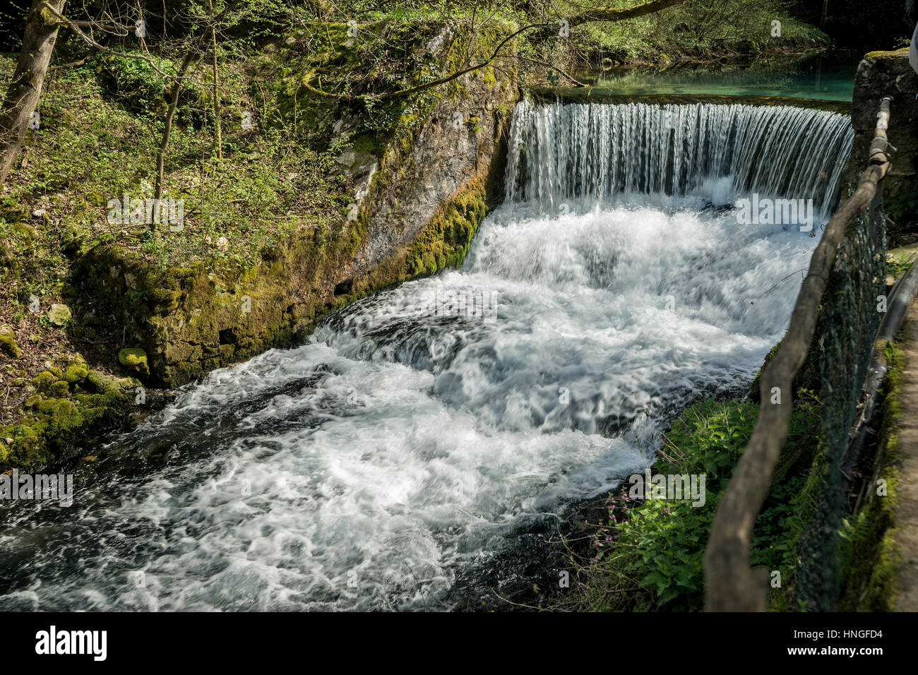 Semicircular dam with small lake that cause waterfall 01 Stock Photo ...