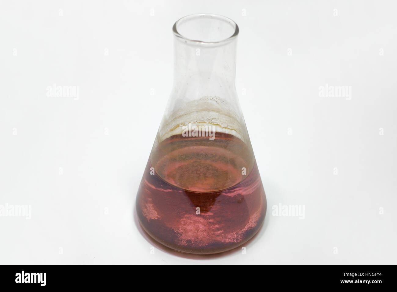 Erlenmeyer flask with potassium permanganate solution. Horizontal Stock ...